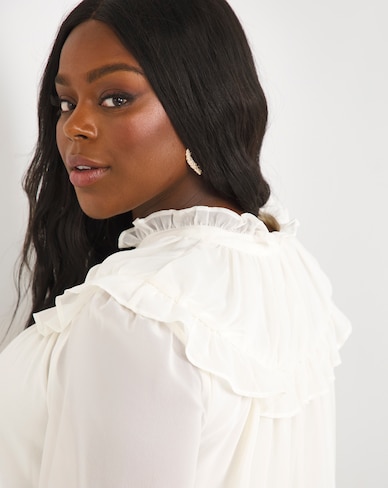 Pristine High Neck Ruffle Blouse with Tie Neck Detail and Sheer Sleeves ...